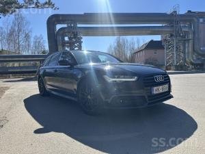 Black Audi A6 2015 in Riga, with an engine capacity of 3.00 L and mileage of 296 thousand km for 13900 €, photo 3 on AUTOMOTO.COM.LV