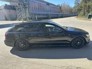 Black Audi A6 2015 in Riga, with an engine capacity of 3.00 L and mileage of 296 thousand km for 13900 €, photo 4 on AUTOMOTO.COM.LV