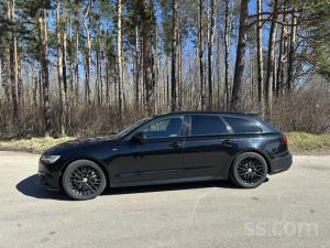 Black Audi A6 2015 in Riga, with an engine capacity of 3.00 L and mileage of 296 thousand km for 13900 €, photo 5 on AUTOMOTO.COM.LV