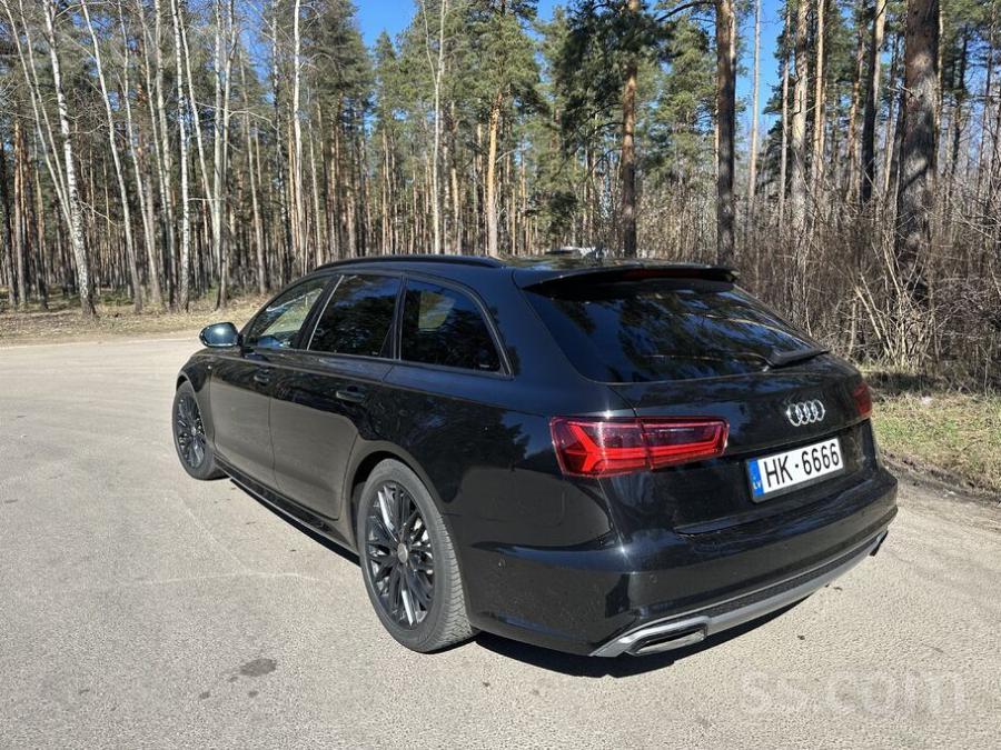 Black Audi A6 2015 in Riga, with an engine capacity of 3.00 L and mileage of 296 thousand km for 13900 €, photo 7 on AUTOMOTO.COM.LV