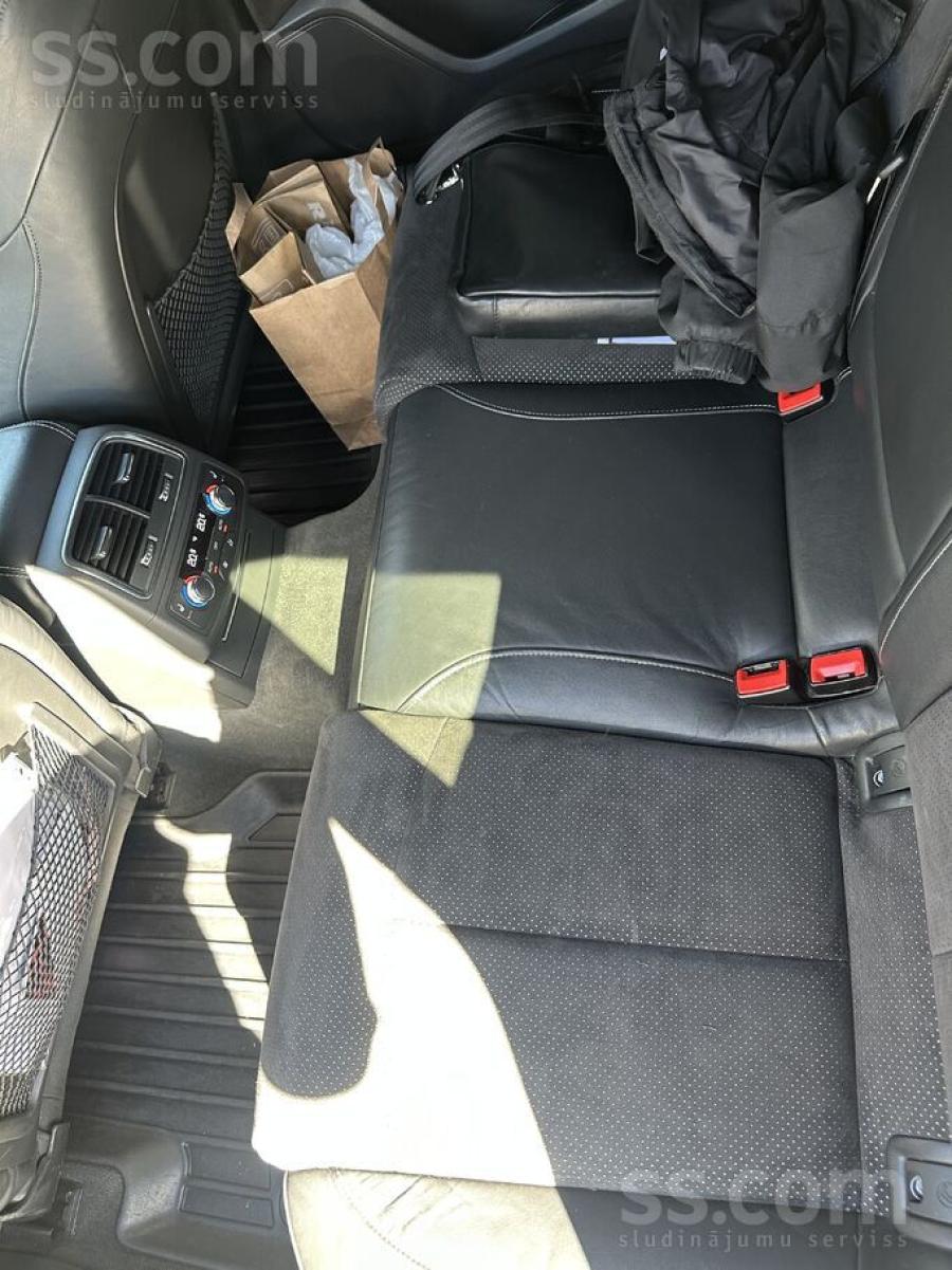 Black Audi A6 2015 in Riga, with an engine capacity of 3.00 L and mileage of 296 thousand km for 13900 €, photo 8 on AUTOMOTO.COM.LV