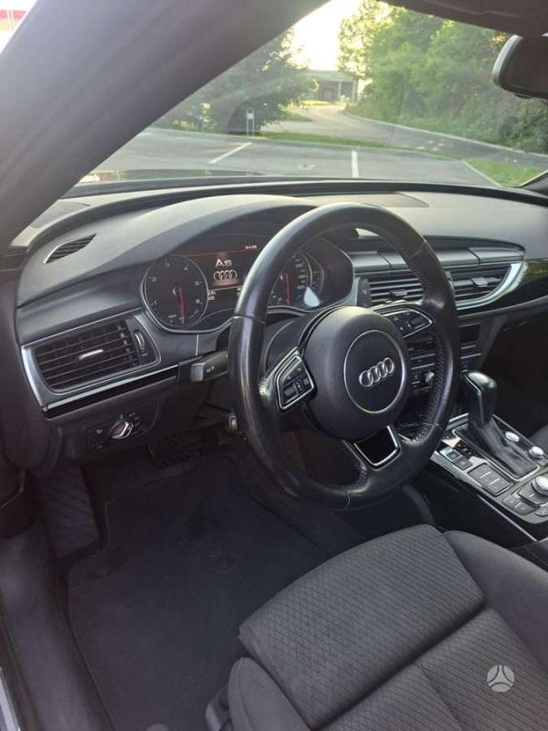 Black Audi A6 2015 in Panevezys, with an engine capacity of 1.97 L and mileage of 325 thousand km for 10500 €, photo 5 on AUTOMOTO.COM.LV