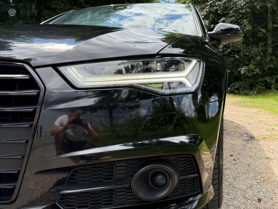 Black Audi A6 2015 in Utena, with an engine capacity of 1.97 L and mileage of 271 thousand km for 15350 €, photo 5 on AUTOMOTO.COM.LV