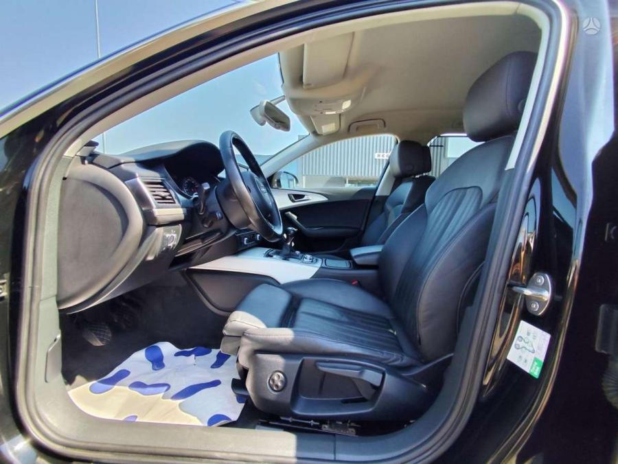 Black Audi A6 2015 in Siauliai, with an engine capacity of 2.00 L and mileage of 245 thousand km for 10990 €, photo 12 on AUTOMOTO.COM.LV