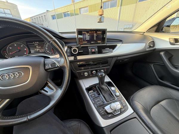 Black Audi A6 2015 in Ukmerge, with an engine capacity of 1.97 L and mileage of 261 thousand km for 11399 €, photo 6 on AUTOMOTO.COM.LV
