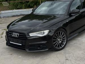 Black Audi A6 2016 in Vilnius, with an engine capacity of 3.00 L and mileage of 311 thousand km for 13900 €, photo 14 on AUTOMOTO.COM.LV