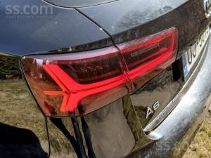 Black Audi A6 2016 in Riga, with an engine capacity of 3.00 L and mileage of 310 thousand km for 9895 €, photo 5 on AUTOMOTO.COM.LV