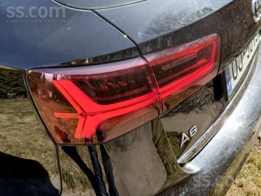 Black Audi A6 2016 in Riga, with an engine capacity of 3.00 L and mileage of 310 thousand km for 9895 €, photo 5 on AUTOMOTO.COM.LV