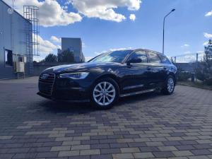 Black Audi A6 2016 in Siauliai, with an engine capacity of 2.00 L and mileage of 336 thousand km for 9750 €, photo 12 on AUTOMOTO.COM.LV