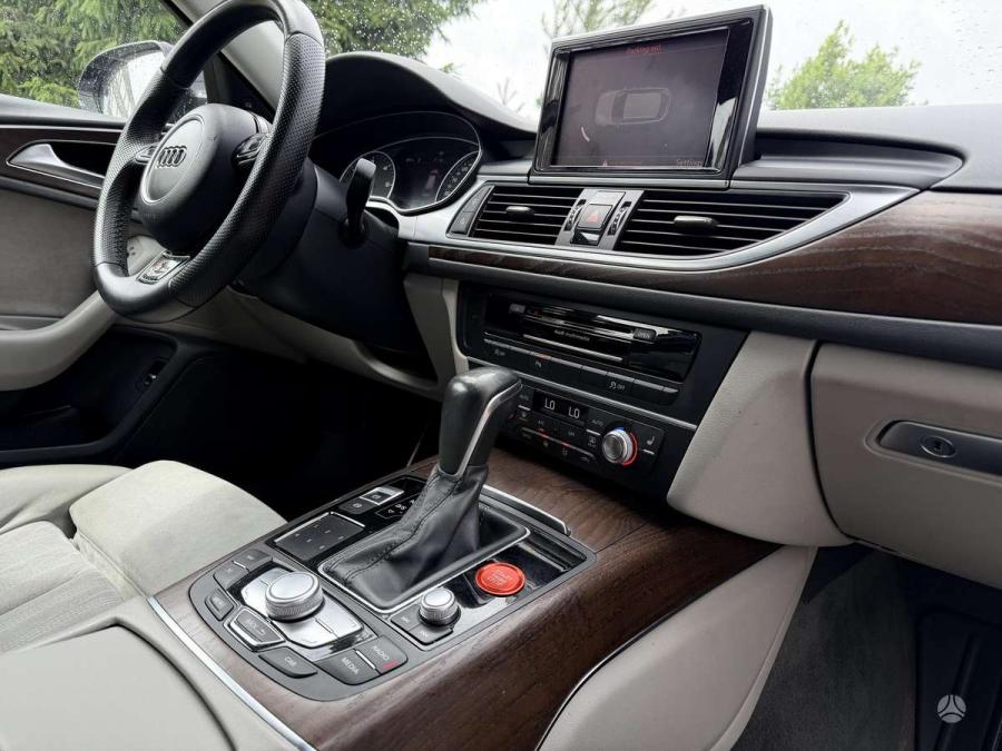 Black Audi A6 2016 in Kaunas, with an engine capacity of 2.97 L and mileage of 300 thousand km for 9350 €, photo 14 on AUTOMOTO.COM.LV
