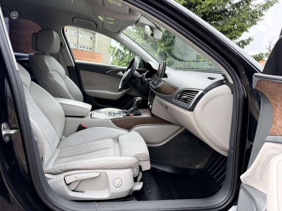 Black Audi A6 2016 in Kaunas, with an engine capacity of 2.97 L and mileage of 300 thousand km for 9350 €, photo 17 on AUTOMOTO.COM.LV