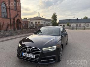 Black Audi A6 2016 in Rezekne, with an engine capacity of 3.00 L and mileage of 255 thousand km for 14750 €, photo 5 on AUTOMOTO.COM.LV