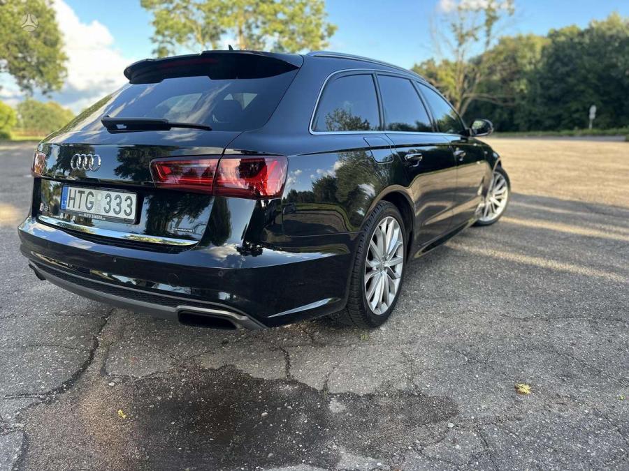 Black Audi A6 2016 in Kaunas, with an engine capacity of 2.97 L and mileage of 268 thousand km for 15900 €, photo 17 on AUTOMOTO.COM.LV