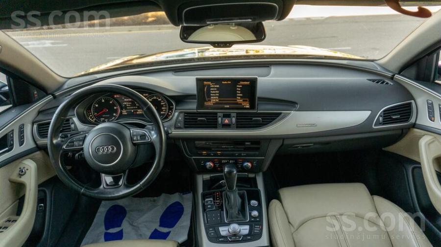 Black Audi A6 2016 in Riga, with an engine capacity of 3.00 L and mileage of 250 thousand km for 14990 €, photo 13 on AUTOMOTO.COM.LV