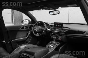Black Audi A6 2017 in Riga, with an engine capacity of 2.00 L and mileage of 232 thousand km for 14990 €, photo 18 on AUTOMOTO.COM.LV