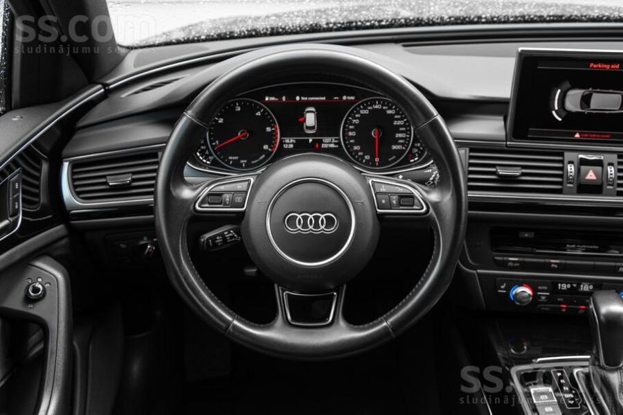 Black Audi A6 2017 in Riga, with an engine capacity of 2.00 L and mileage of 232 thousand km for 14990 €, photo 21 on AUTOMOTO.COM.LV