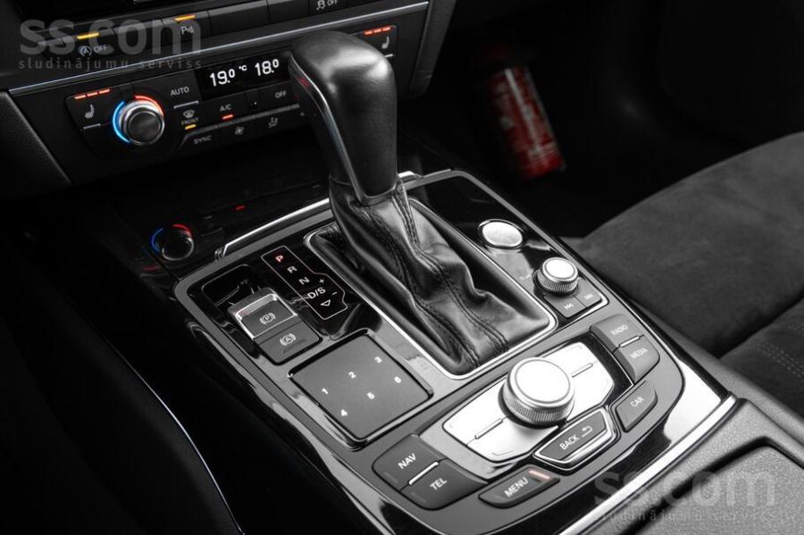 Black Audi A6 2017 in Riga, with an engine capacity of 2.00 L and mileage of 232 thousand km for 14990 €, photo 25 on AUTOMOTO.COM.LV