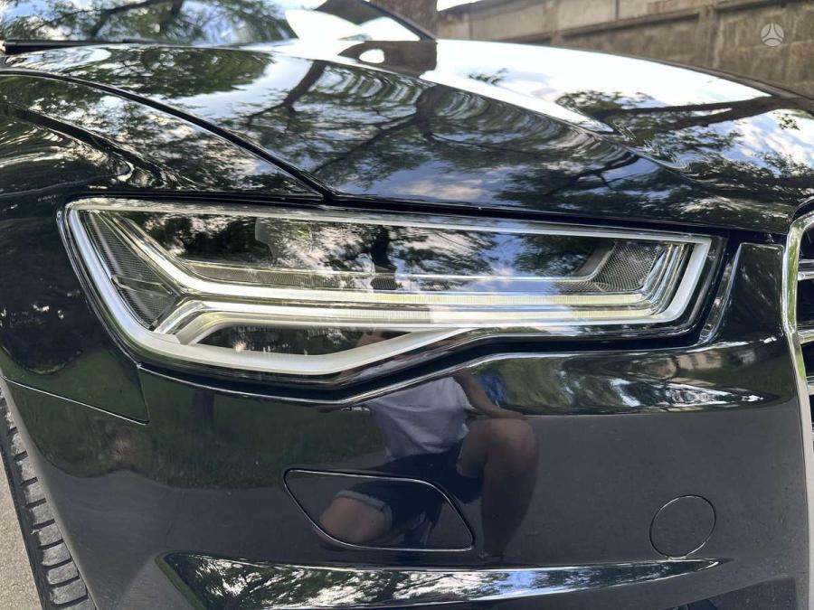 Black Audi A6 2017 in Panevezys, with an engine capacity of 2.97 L and mileage of 185 thousand km for 18900 €, photo 8 on AUTOMOTO.COM.LV