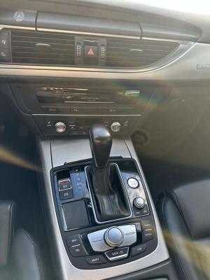Black Audi A6 2017 in Panevezys, with an engine capacity of 2.97 L and mileage of 185 thousand km for 18900 €, photo 18 on AUTOMOTO.COM.LV