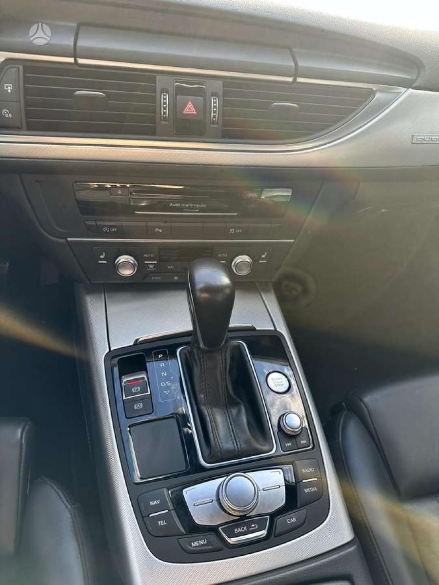Black Audi A6 2017 in Panevezys, with an engine capacity of 2.97 L and mileage of 185 thousand km for 18900 €, photo 18 on AUTOMOTO.COM.LV