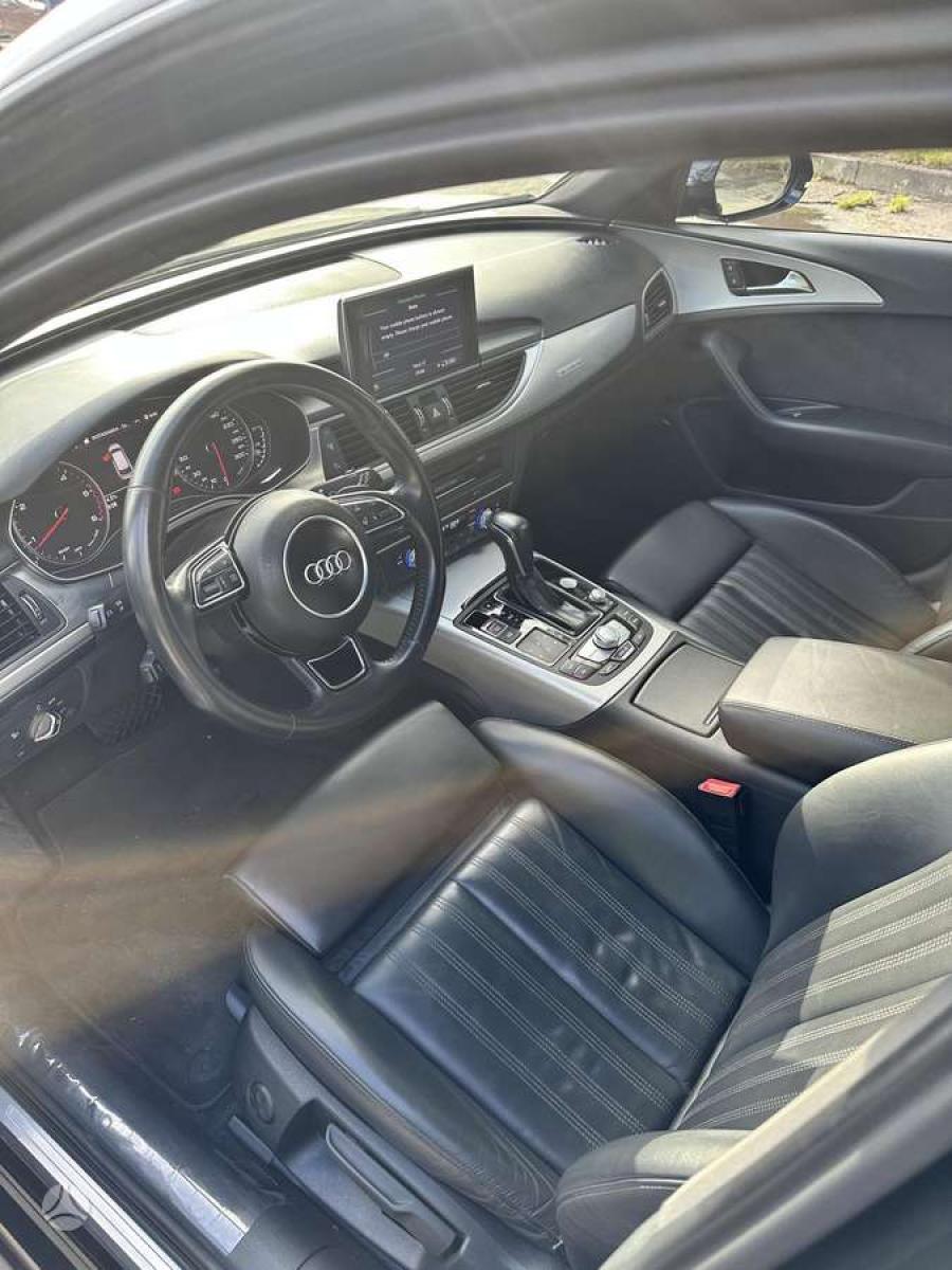 Black Audi A6 2017 in Panevezys, with an engine capacity of 2.97 L and mileage of 185 thousand km for 18900 €, photo 21 on AUTOMOTO.COM.LV