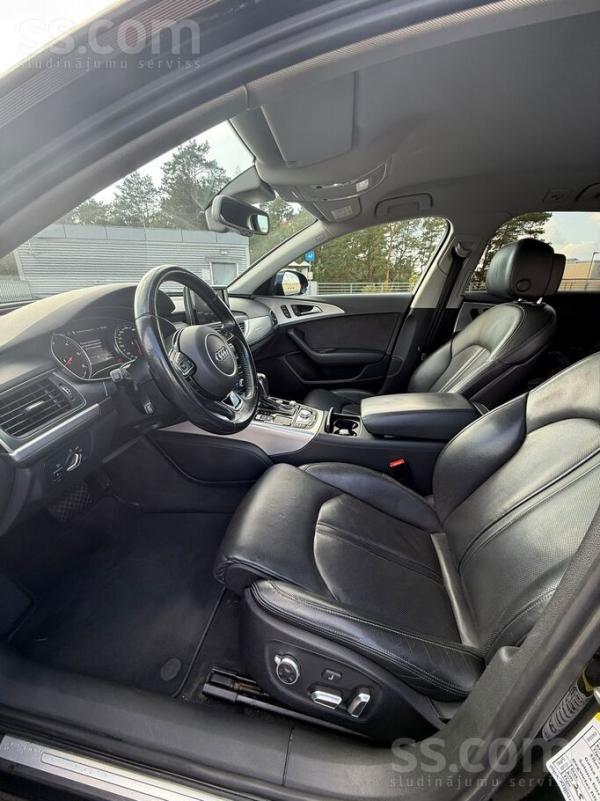 Black Audi A6 2017 in Riga, with an engine capacity of 3.00 L and mileage of 265 thousand km for 14999 €, photo 9 on AUTOMOTO.COM.LV