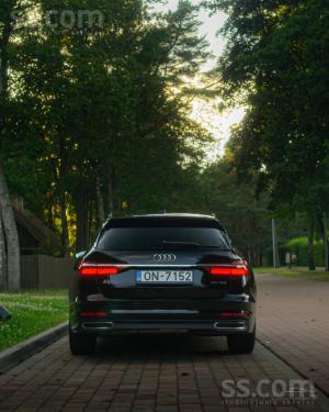 Black Audi A6 2022 in Riga, with an engine capacity of 2.00 L and mileage of 158 thousand km for 21500 €, photo 4 on AUTOMOTO.COM.LV