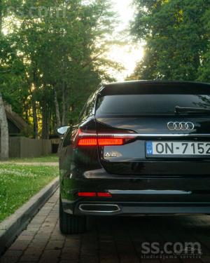 Black Audi A6 2022 in Riga, with an engine capacity of 2.00 L and mileage of 158 thousand km for 21500 €, photo 5 on AUTOMOTO.COM.LV