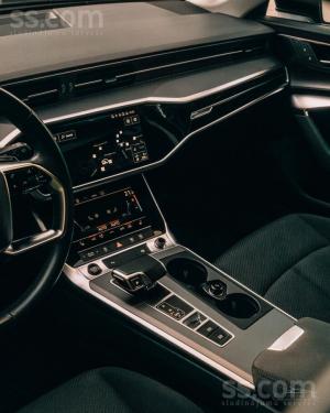 Black Audi A6 2022 in Riga, with an engine capacity of 2.00 L and mileage of 158 thousand km for 21500 €, photo 12 on AUTOMOTO.COM.LV