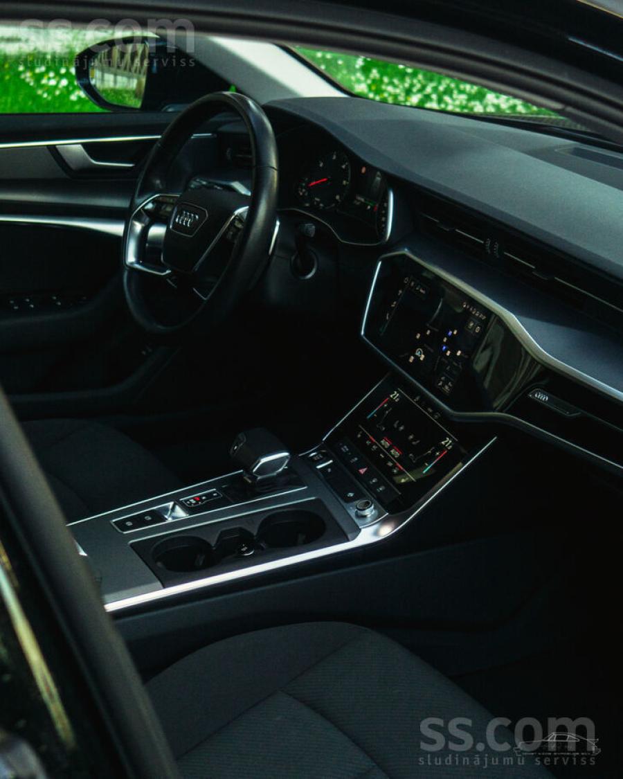 Black Audi A6 2022 in Riga, with an engine capacity of 2.00 L and mileage of 158 thousand km for 21500 €, photo 21 on AUTOMOTO.COM.LV