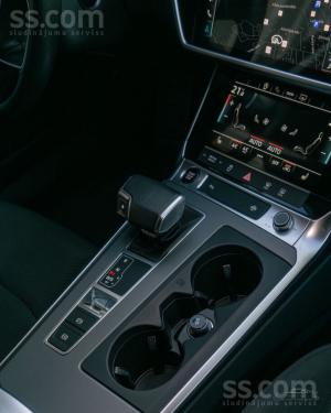 Black Audi A6 2022 in Riga, with an engine capacity of 2.00 L and mileage of 158 thousand km for 21500 €, photo 23 on AUTOMOTO.COM.LV