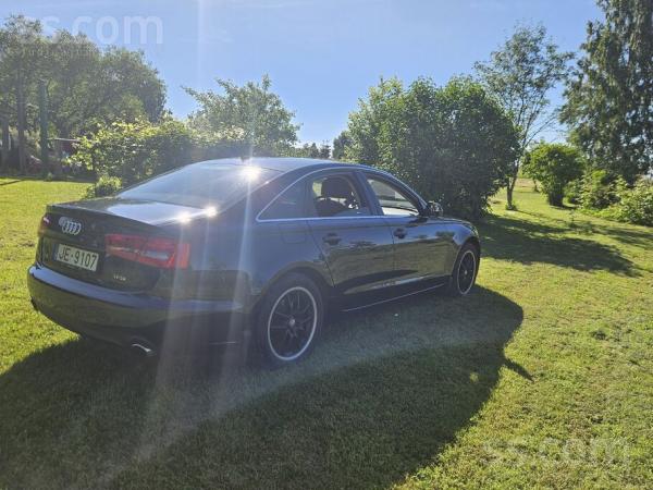 Blue Audi A6 2012 in Riga, with an engine capacity of 2.00 L and mileage of 244 thousand km for 8300 €, photo 3 on AUTOMOTO.COM.LV
