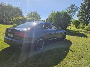 Blue Audi A6 2012 in Riga, with an engine capacity of 2.00 L and mileage of 244 thousand km for 8300 €, photo 4 on AUTOMOTO.COM.LV