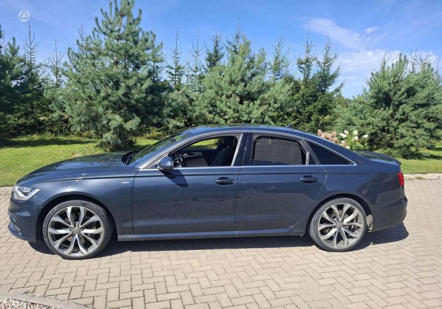 Blue Audi A6 2012 in Utena, with an engine capacity of 2.97 L and mileage of 372 thousand km for 10500 €, photo 4 on AUTOMOTO.COM.LV