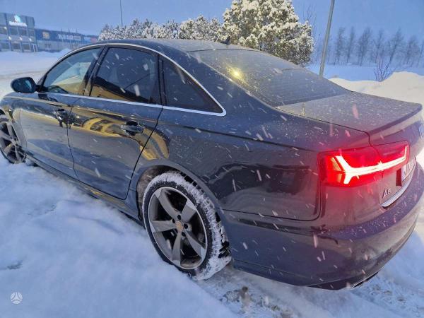 Blue Audi A6 2015 in Taurage, with an engine capacity of 2.97 L and mileage of 281 thousand km for 9900 €, photo 4 on AUTOMOTO.COM.LV