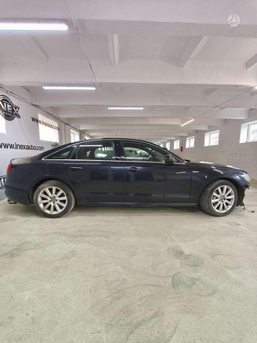 Blue Audi A6 2015 in Panevezys, with an engine capacity of 3.00 L and mileage of 199 thousand km for 5900 €, photo 5 on AUTOMOTO.COM.LV