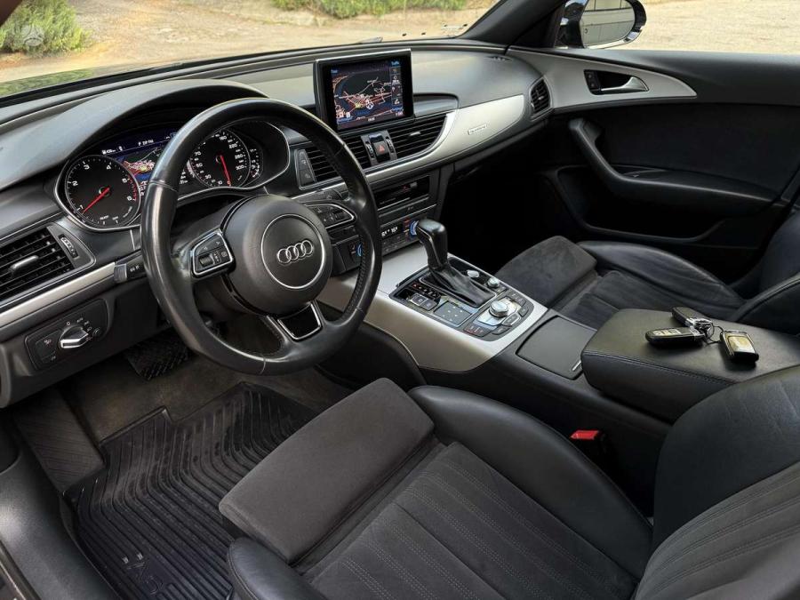 Blue Audi A6 2018 in Prienai, with an engine capacity of 2.00 L and mileage of 265 thousand km for 14900 €, photo 25 on AUTOMOTO.COM.LV