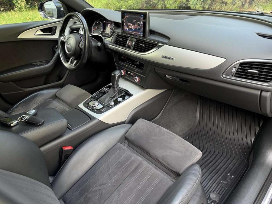 Blue Audi A6 2018 in Prienai, with an engine capacity of 2.00 L and mileage of 265 thousand km for 14900 €, photo 33 on AUTOMOTO.COM.LV