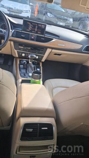 Blue Audi A6 2013 in Riga, with an engine capacity of 3.00 L and mileage of 263 thousand km for 8000 €, photo 14 on AUTOMOTO.COM.LV
