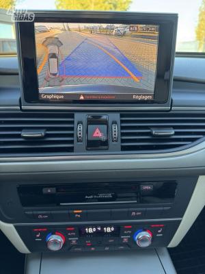 Blue Audi A6 2016 in Taurage, with an engine capacity of 2.00 L and mileage of 261 thousand km for 10900 €, photo 12 on AUTOMOTO.COM.LV