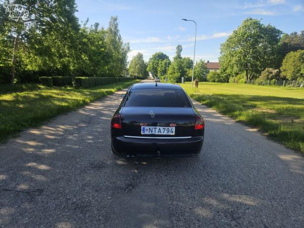 Brown Audi A6 2003 in Jonava, with an engine capacity of 2.50 L and mileage of 361 thousand km for 1350 €, photo 7 on AUTOMOTO.COM.LV