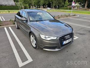 Brūns Audi A6 2011 Rīga, ar dzinēja tilpumu 3.00 L un nobraukumu 244 tūkst. km par 10290 €, foto  vietnē AUTOMOTO.COM.LV