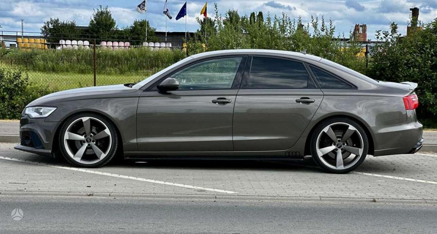 Brown Audi A6 2011 in Kretinga, with an engine capacity of 2.97 L and mileage of 319 thousand km for 10999 €, photo 6 on AUTOMOTO.COM.LV