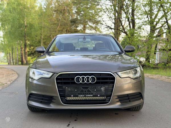 Brown Audi A6 2012 in Utena, with an engine capacity of 1.97 L and mileage of 316 thousand km for 7990 €, photo 6 on AUTOMOTO.COM.LV