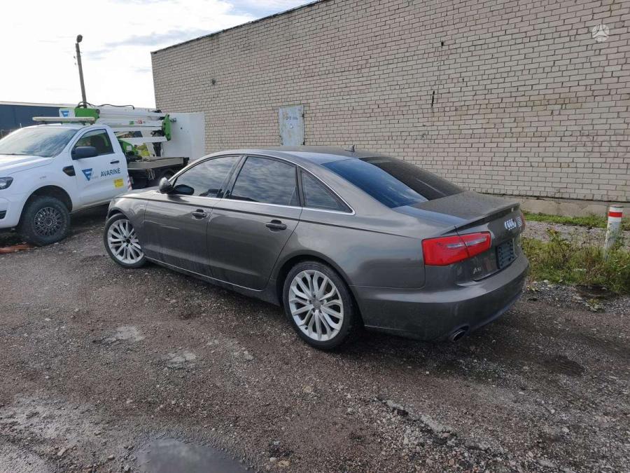 Brown Audi A6 2012 in Klaipeda, with an engine capacity of 3.00 L and mileage of 250 thousand km for 4800 €, photo 14 on AUTOMOTO.COM.LV