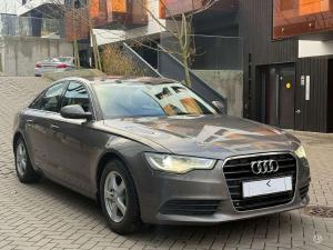 Brūns Audi A6 2013 Kauņa, ar dzinēja tilpumu 1.97 L un nobraukumu 239 tūkst. km par 8950 €, foto  vietnē AUTOMOTO.COM.LV