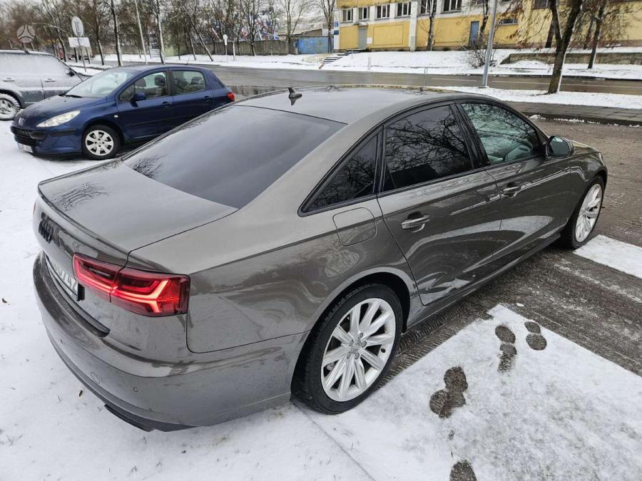 Brown Audi A6 2015 in Vilnius, with an engine capacity of 3.00 L and mileage of 299 thousand km for 16500 €, photo 3 on AUTOMOTO.COM.LV