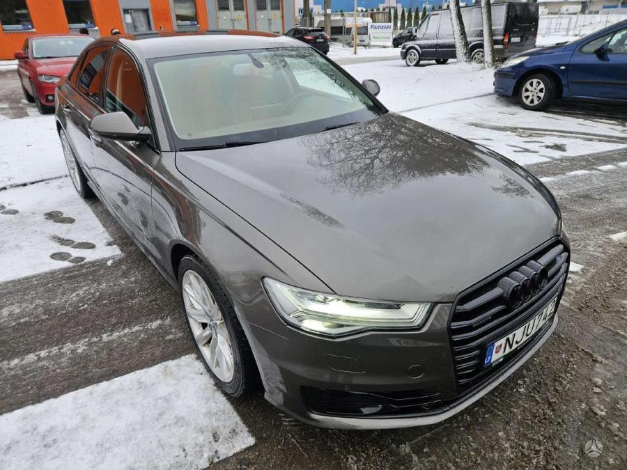Brown Audi A6 2015 in Vilnius, with an engine capacity of 3.00 L and mileage of 299 thousand km for 16500 €, photo 6 on AUTOMOTO.COM.LV