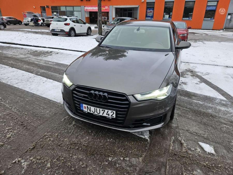 Brown Audi A6 2015 in Vilnius, with an engine capacity of 3.00 L and mileage of 299 thousand km for 16500 €, photo 7 on AUTOMOTO.COM.LV