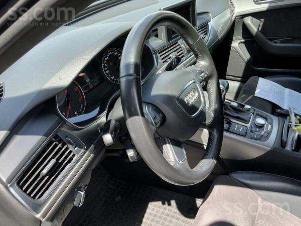 Brown Audi A6 2012 in Riga, with an engine capacity of 3.00 L and mileage of 333 thousand km for 8990 €, photo 8 on AUTOMOTO.COM.LV